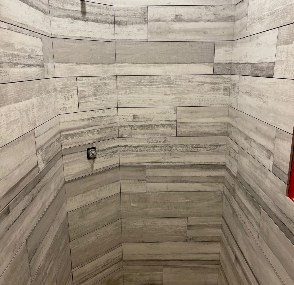 Book-Matched Tile Installation - A Mesmerizing Symmetrical Effect